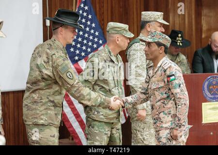 Deputy Commander Lt. Col. Jeremy Baran prepares the officers of the ...