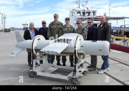 From right, U.S. Navy Aerographer's Mate 2nd Class Cory Clare and Lt ...