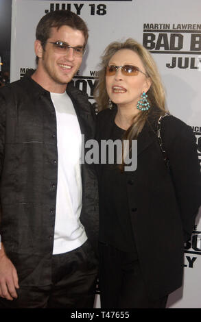 Actress Faye Dunaway and her son Liam, center, talk with Diddy, right ...