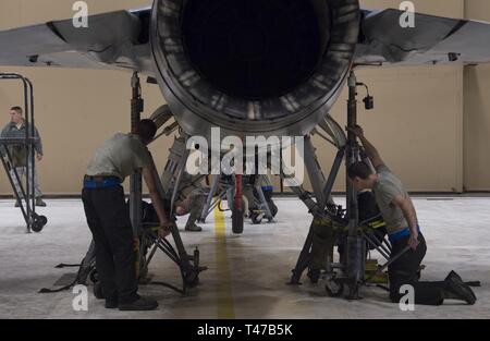Airmen from the 311th Aircraft Maintenance Unit conduct an F-16 Viper ...