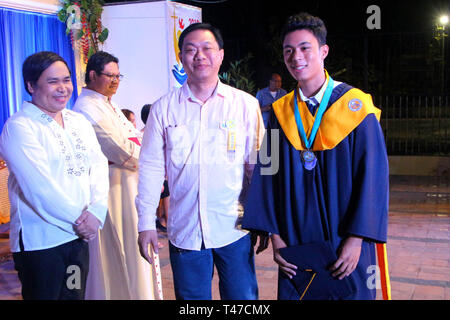 Philippines. 08th Apr, 2019. Dr. Joseph Villafuerte (left) putting the ...
