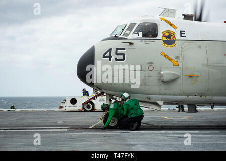 Sailors assigned to the "Rawhides" of Fleet Logistics Support Squadron ...