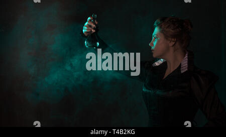 Scientist researcher with a flask of radioactive material. The study of ...