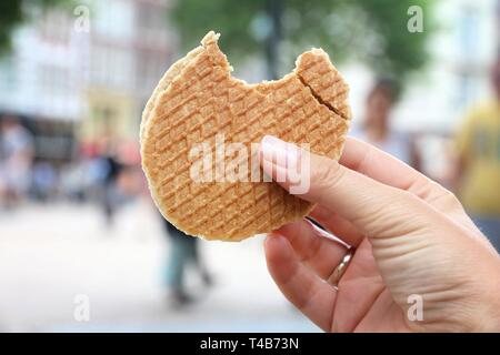 Stroopwafel in Amsterdam is typical Dutch food two circular pieces of ...