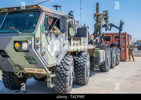An M1075 palletized load system truck assigned to 15th Transportation ...