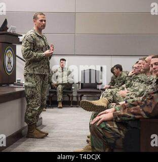 Capt. Joshua Lasky, Naval Special Warfare Group 4 commodore, paid a ...