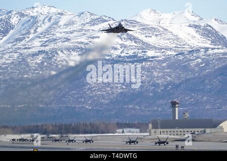 An F-22 Raptor takes off after Raptors from the 3rd Wing and 477th ...