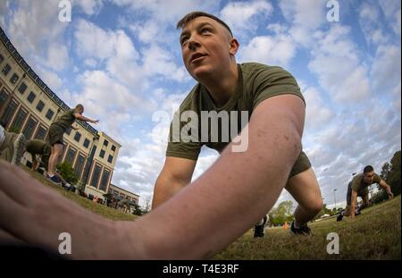 A Marine with Marine Forces Reserve, conducts a buddy drag during the ...