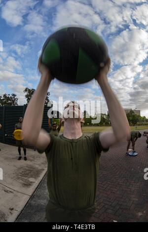 A Marine with Marine Forces Reserve, conducts a buddy drag during the ...