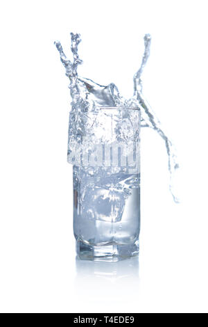 water spilling from glass isolated on white Stock Photo - Alamy