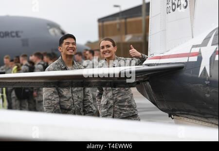 Air Force ROTC cadets pose for a photo inside a WC-130 Hercules during ...