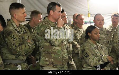 Col. James G. Kent (right), commander, 4th Sustainment Brigade, leads ...