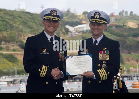 SAN DIEGO (April 5, 2019) Cmdr. Todd Santala, is relieved by Cmdr ...