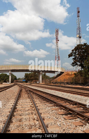 Rail head operations at mine with new wagons on train being loaded with ...