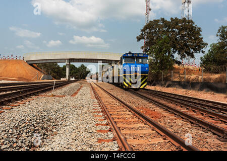 Rail head operations at mine with new wagons on train being loaded with ...