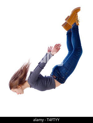 Side view of woman in zero gravity or a fall. girl is flying, falling ...