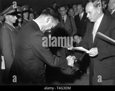 Minister of Defense Theodor Blank (M) presents on 12 November 1955 in ...