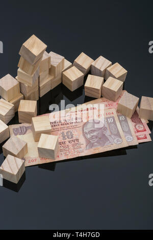 Pile of Indian rupee banknotes in a golden bowl Stock Photo - Alamy