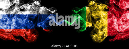 Russia and Mali two flags on flagpoles and blue cloudy sky Stock Photo ...