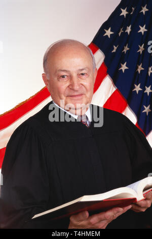 Judge in an american courtroom, a bald hispanic man with a beard, holds ...
