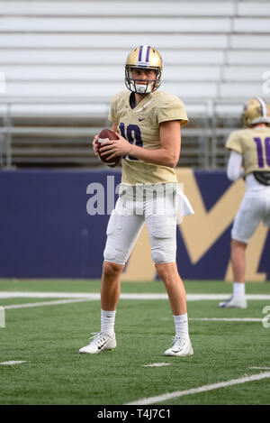 Seattle, WA, USA. 17th Apr, 2019. UW quaterback JACOB EASON (10) hands ...