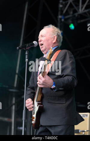 Peter Langford of the Barron Knights performing at Wychwood festival ...