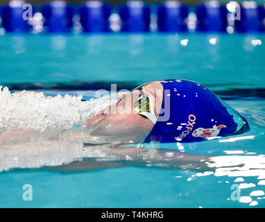 Nickolas Skelton competing in his heat of the Mens 100m Backstroke ...