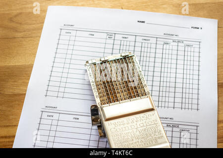vintage adding machine on ledger accounting page Stock Photo - Alamy
