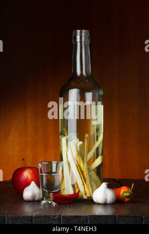 Herbal and spices flavored vodka Stock Photo - Alamy