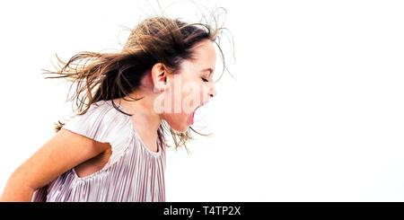 Little girl child yelling, shouting and screaming with bad manners. Angry upset girl is arguing ...