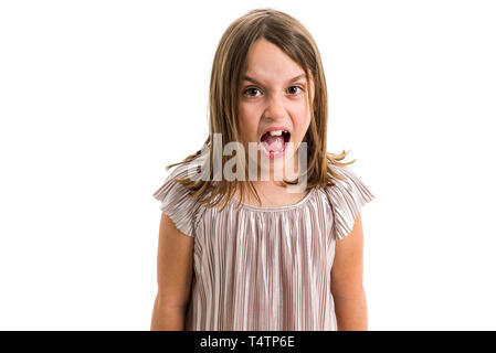 Little young girl is angry, mad, disobedient with bad behaviour ...