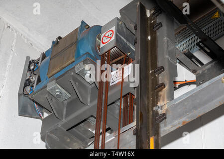 Inside elevator shaft and traction ropes. Elevator shaft maintenance ...