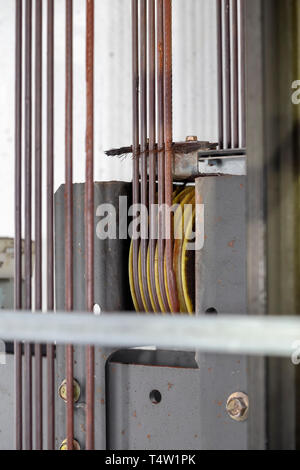 Inside elevator shaft and traction ropes. Elevator shaft maintenance ...