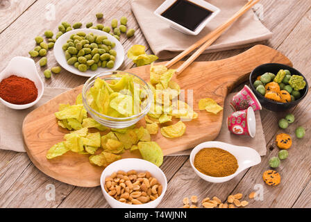 Wasabi flavour potato crisps Stock Photo - Alamy