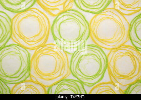 Thai mulberry ringlet paper with green and yellow funneling whirls of ...