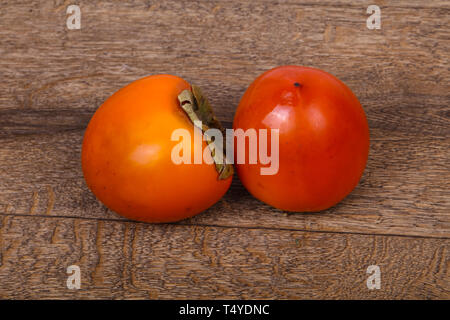 Sweet tasty rioe persimmon fruit Stock Photo - Alamy