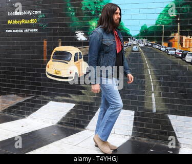 A mural of the Abbey Road zebra crossing features on the side of a ...