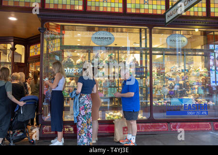 People queue to buy Easter eggs from Haigh's chocolate store in George ...