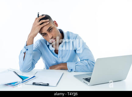 Office Environment - Frustrated overworked office worker at her desk ...