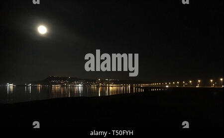 The full moon rises over Portland, Ore., on May 31, 2026. (Photo by ...