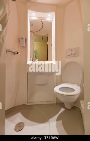 Toilet & Window In Very Small Room Stock Photo - Alamy