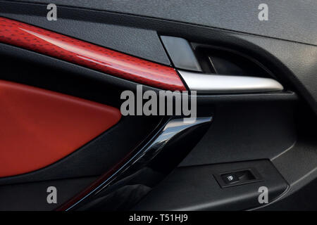A car door handle from inside Stock Photo - Alamy