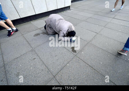 London, England, UK. Man begging on Piccadilly in front of the Caviar ...