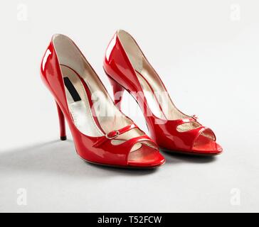 Single high heel stiletto pump resting on its side. Woman's spiked high ...