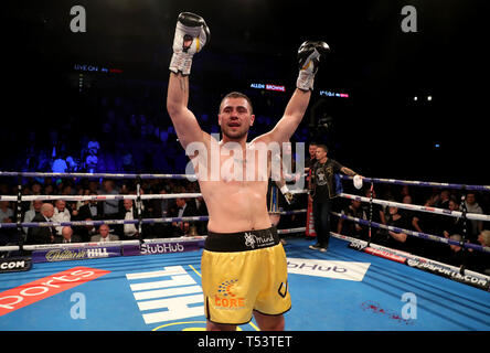 David Allen raises his arms in victory after his win against Lucas ...