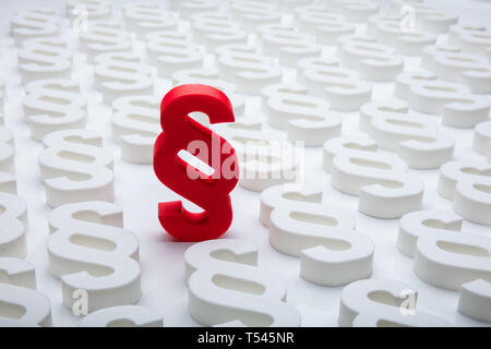 Red Paragraph Symbol Leading Others On Grey Background Stock Photo - Alamy