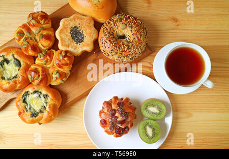 Top view of a table with tea, sunflower seeds, and a smartphone on a ...