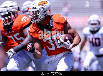 Oklahoma State running back Chuba Hubbard (30) carries past Kansas ...