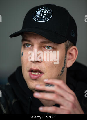 Buxtehude, Germany. 12th Apr, 2019. Marcel Eris, YouTuber, sits in his ...