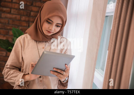 muslim student with tablet pc Stock Photo - Alamy